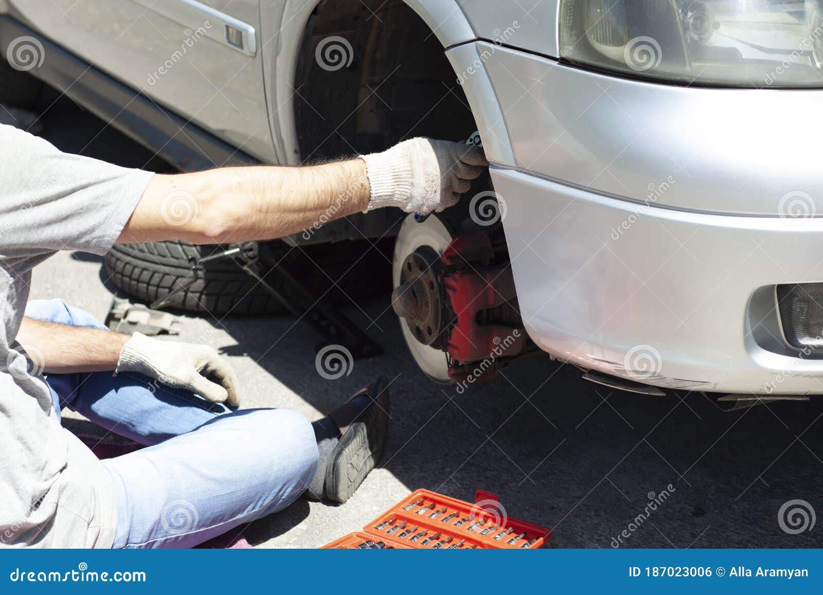 Worker Man Remove the Car Tire Stock Photo - Image of people, equipment ...