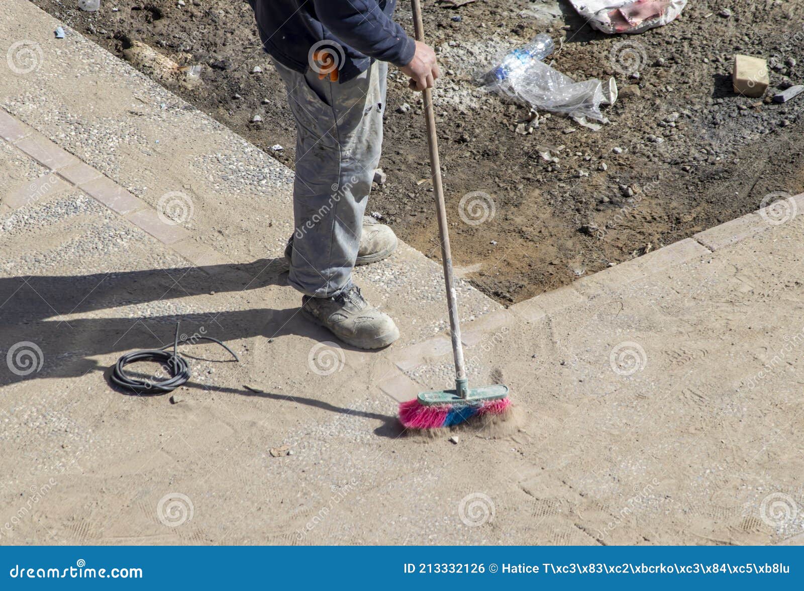 Worker Man Sweeping Construction Workplace. Stock Photo - Image of ...