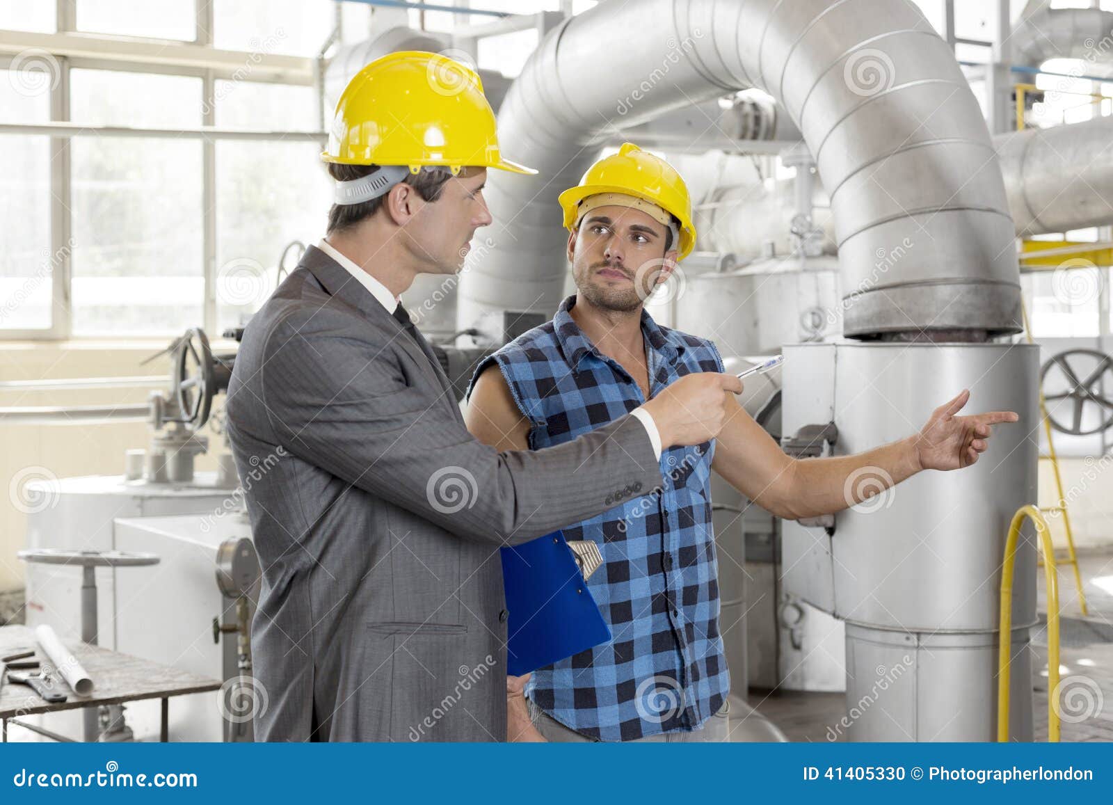 Worker with Manager Inspecting Industrial Area Stock Photo - Image of ...