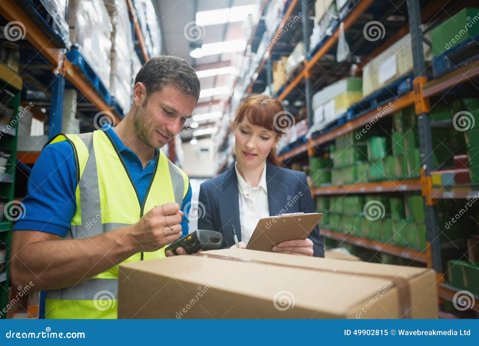 Worker and Manager Scanning Package in Warehouse Stock Image - Image of ...