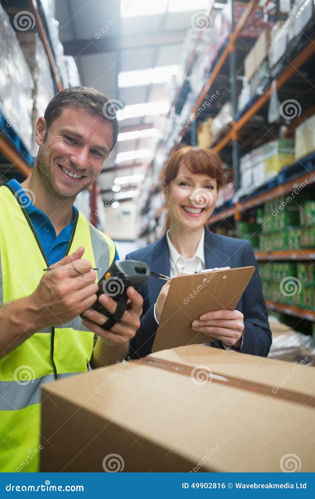 Worker and Manager Scanning Package in Warehouse Stock Photo - Image of ...