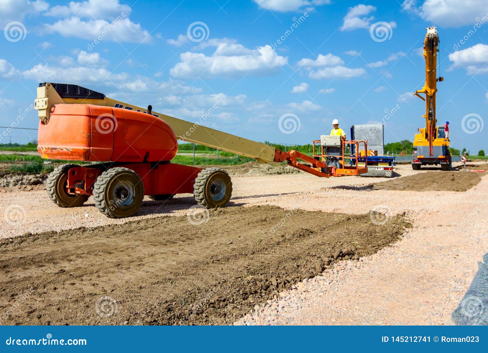 Worker is Managing a Cherry Picker at Building Site Editorial Photo ...