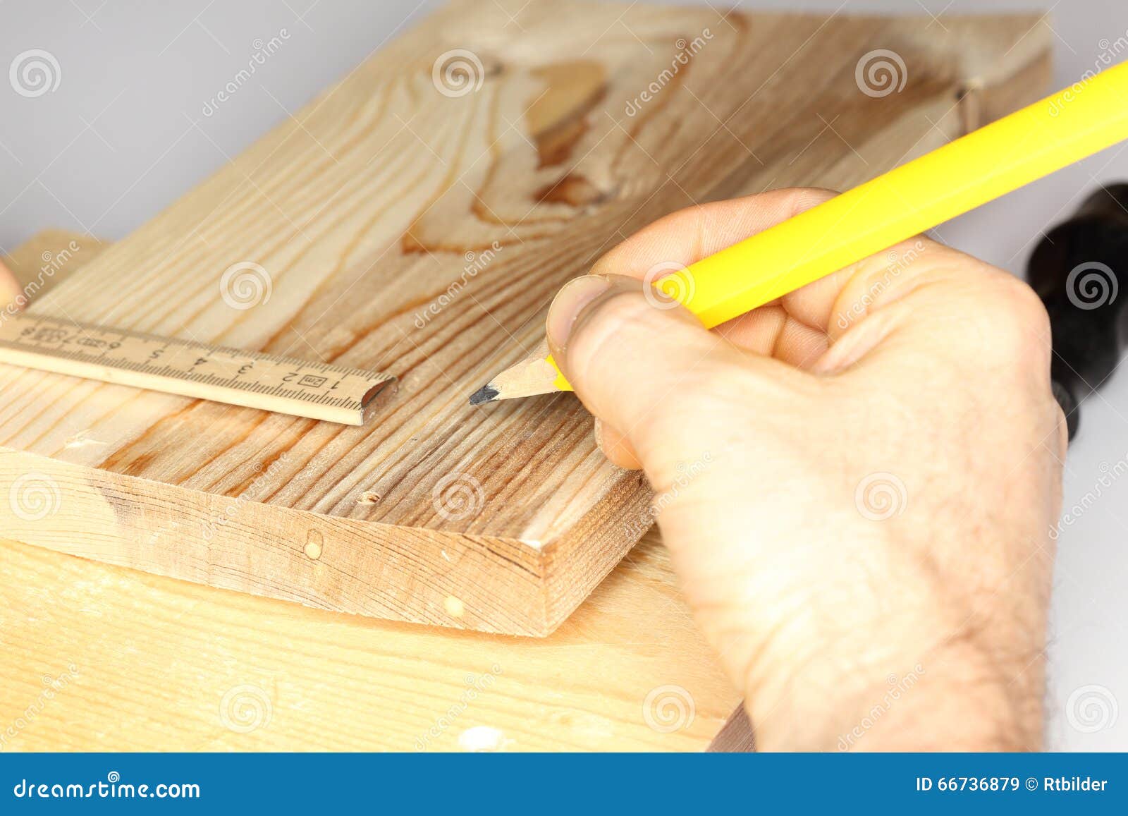 Worker is marking stock image. Image of hand, cutting - 66736879