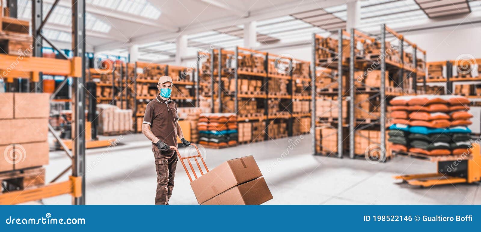 Worker with Mask in a Warehouse Stock Photo - Image of male ...