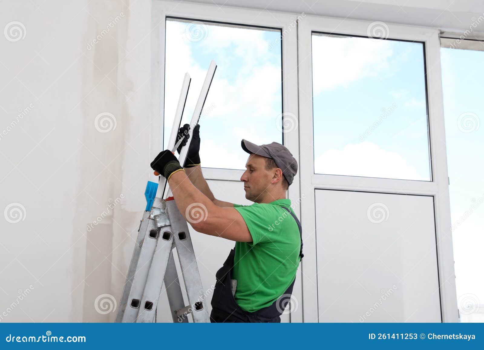 Worker with Materials for Window Installation Indoors Stock Image ...