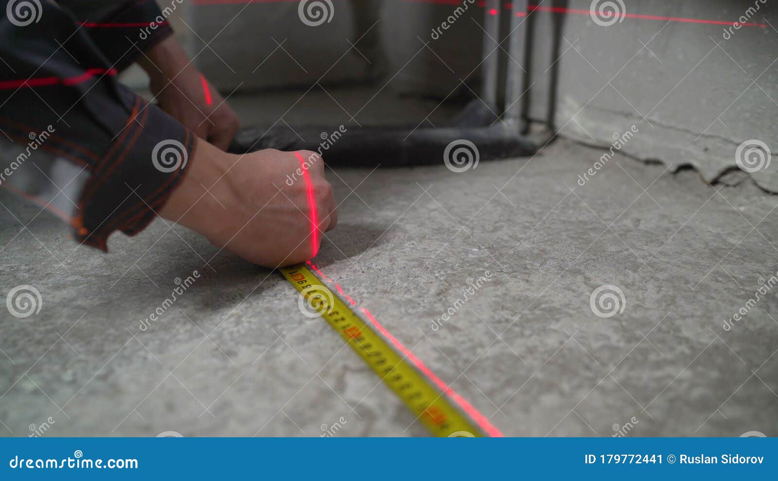 Hands of Engineer Working on the Walk Way. Worker Measures on Concrete ...