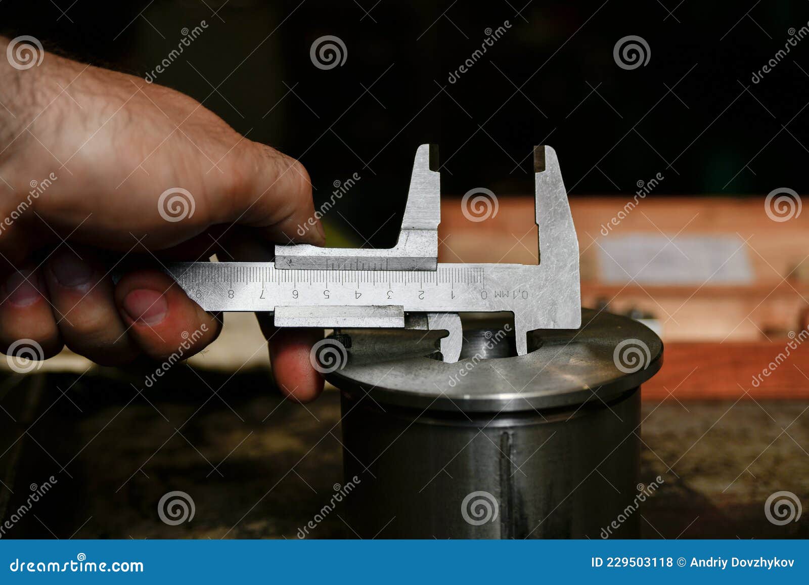 The Worker Measures the Inner Diameter of the Hole on the Adapter ...