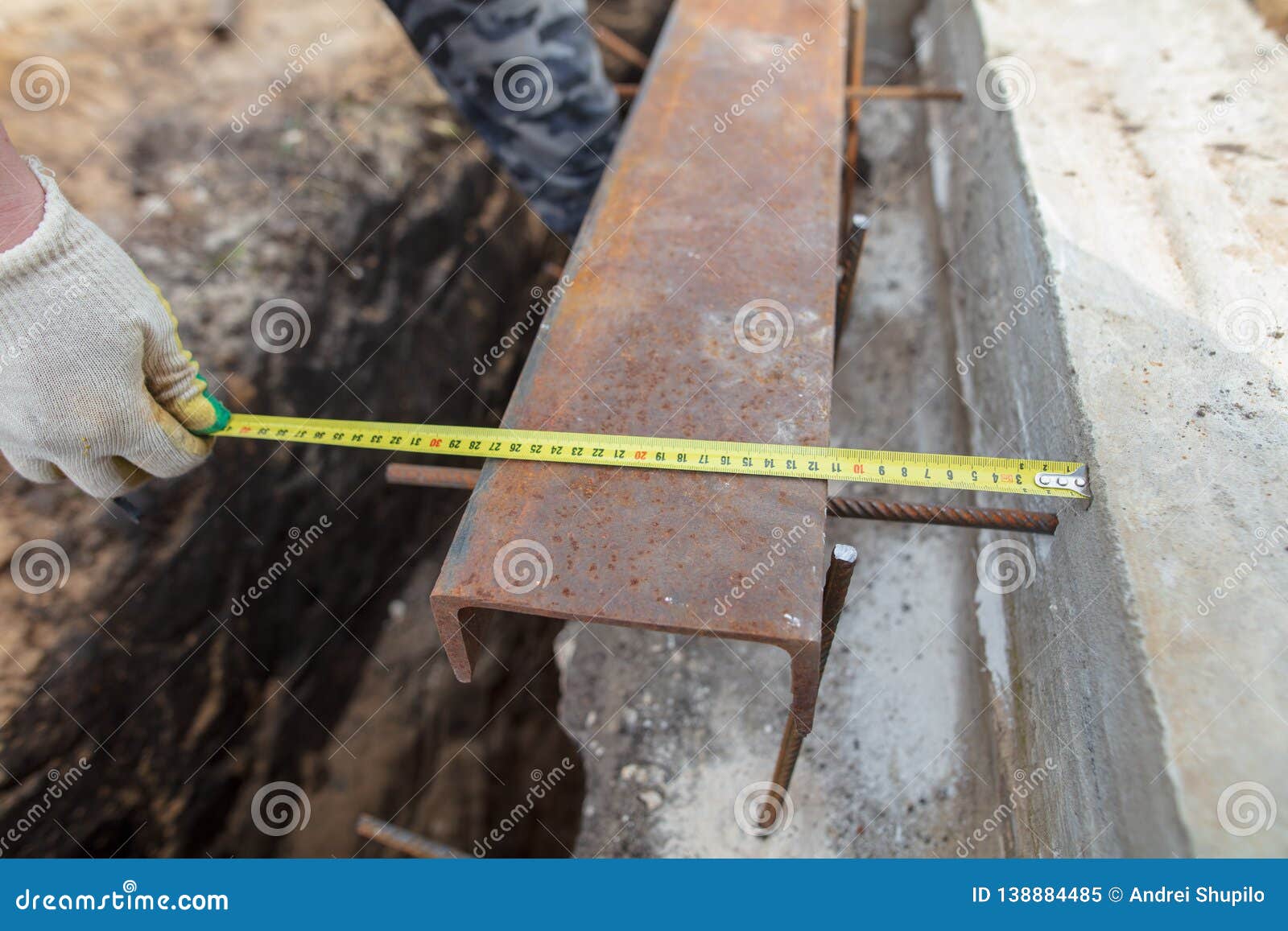 The Worker Measures the Length at the Construction Site Stock Image ...