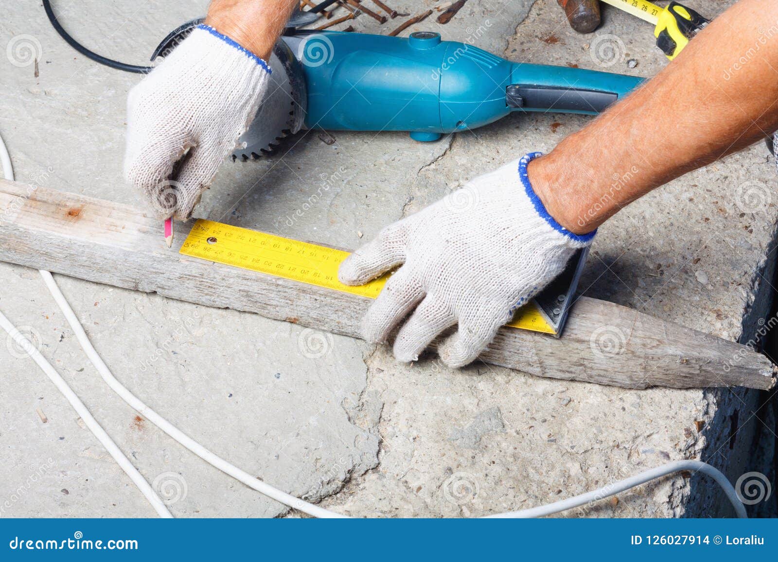 The Worker Measures the Ruler with the Distance on Wooden Board Stock ...