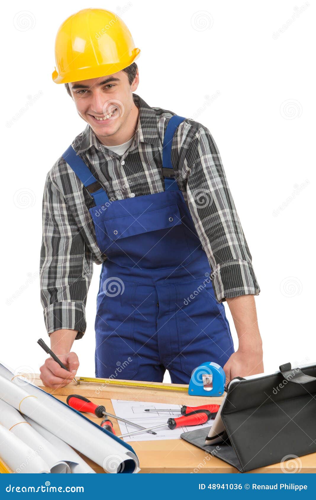 A worker measuring a board stock photo. Image of house - 48941036
