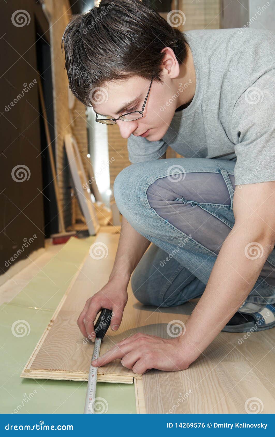 Worker Measuring at Flooring Works Stock Photo - Image of expert, deck ...