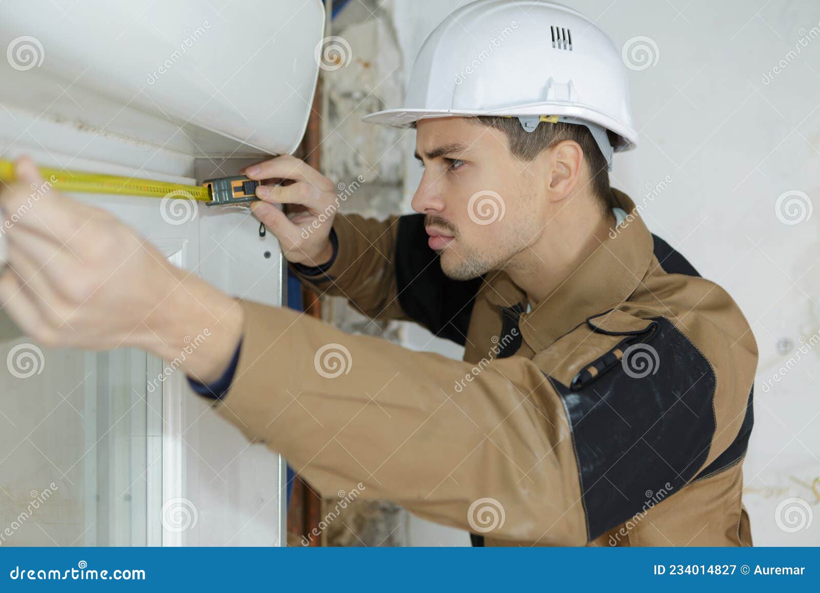 Worker Measuring Length Window Frame at Construction Site Stock Image ...