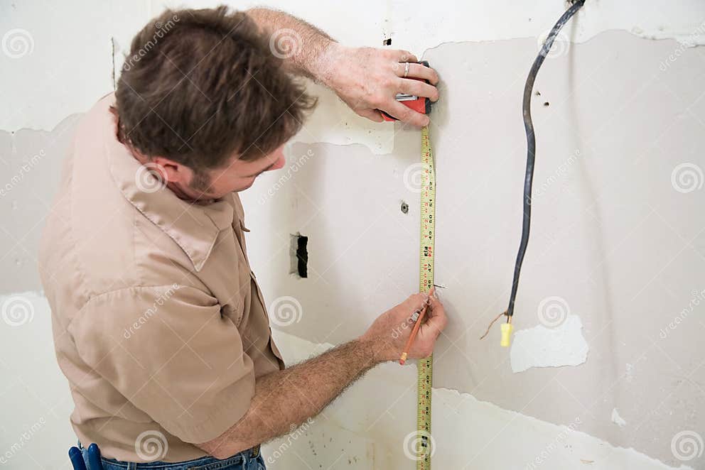 Worker Measuring and Marking Stock Photo - Image of electrician ...