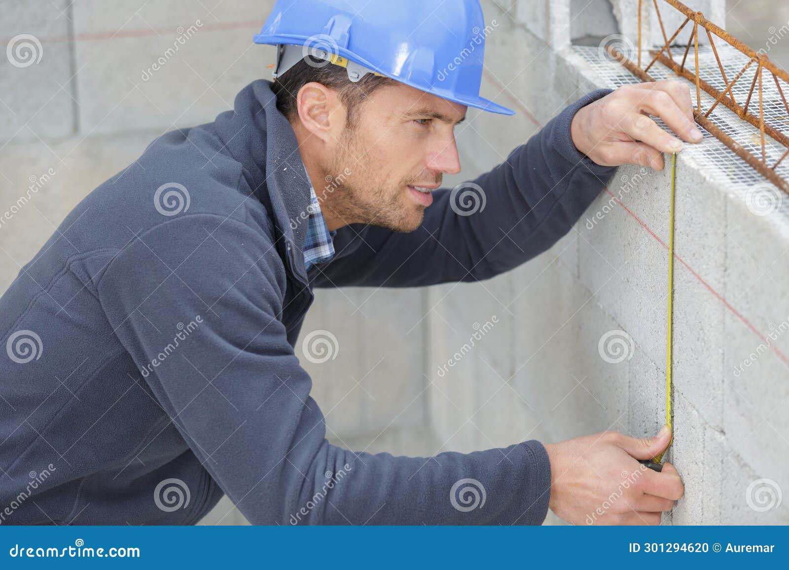 Worker Measuring Outside Facade Stock Photo - Image of bubblejacket ...