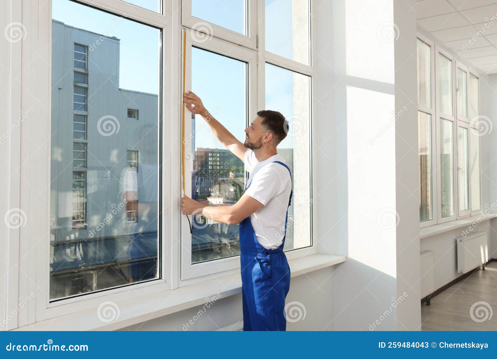 Worker Measuring Plastic Window Indoors. Installation Process Stock ...