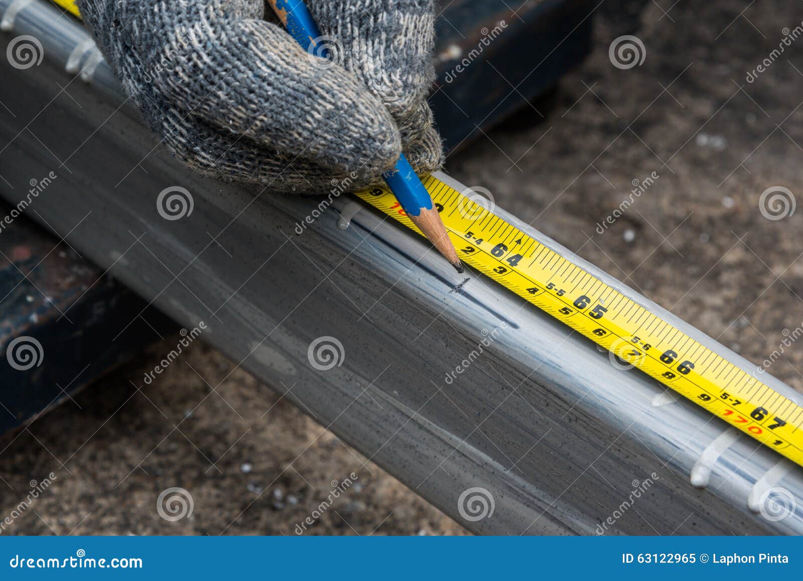 Worker measuring steel stock image. Image of yellow, tool - 63122965