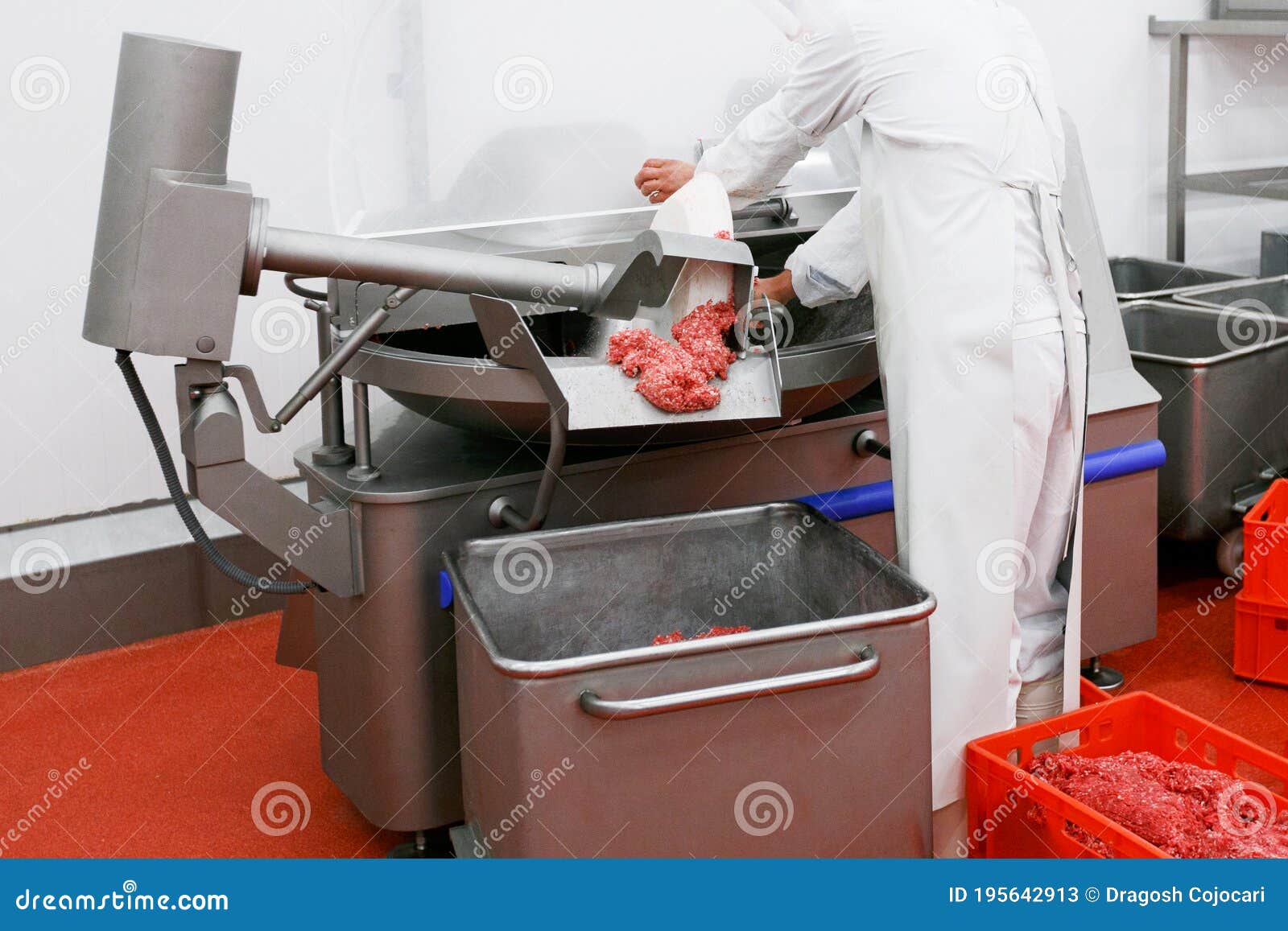 A Worker at the Meat Processing Factory, Adds Spices To Minced Meat in ...