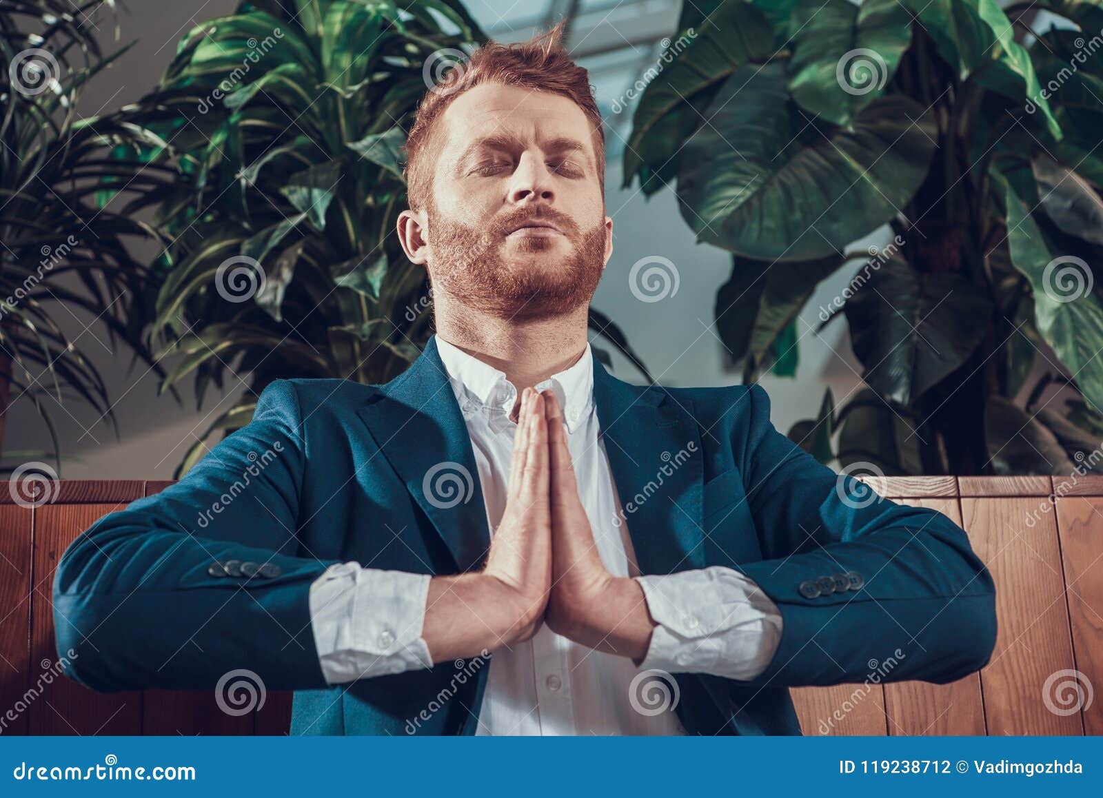 Worker Meditating on Bench in Office. Stock Photo - Image of positive ...