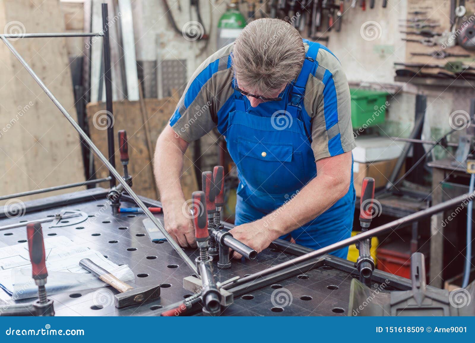 Worker in Metal Workshop with Tools and Workpiece Stock Image - Image ...