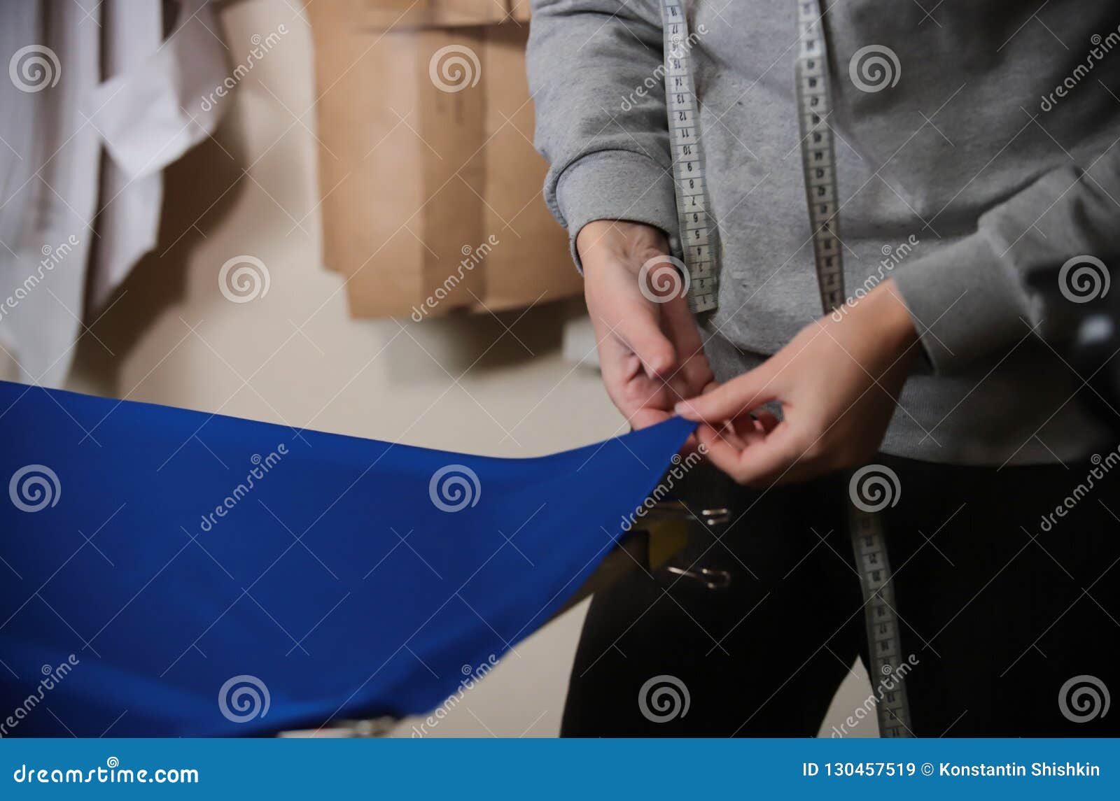 Worker at the Factory Holding a Cloth Stock Image - Image of factory ...