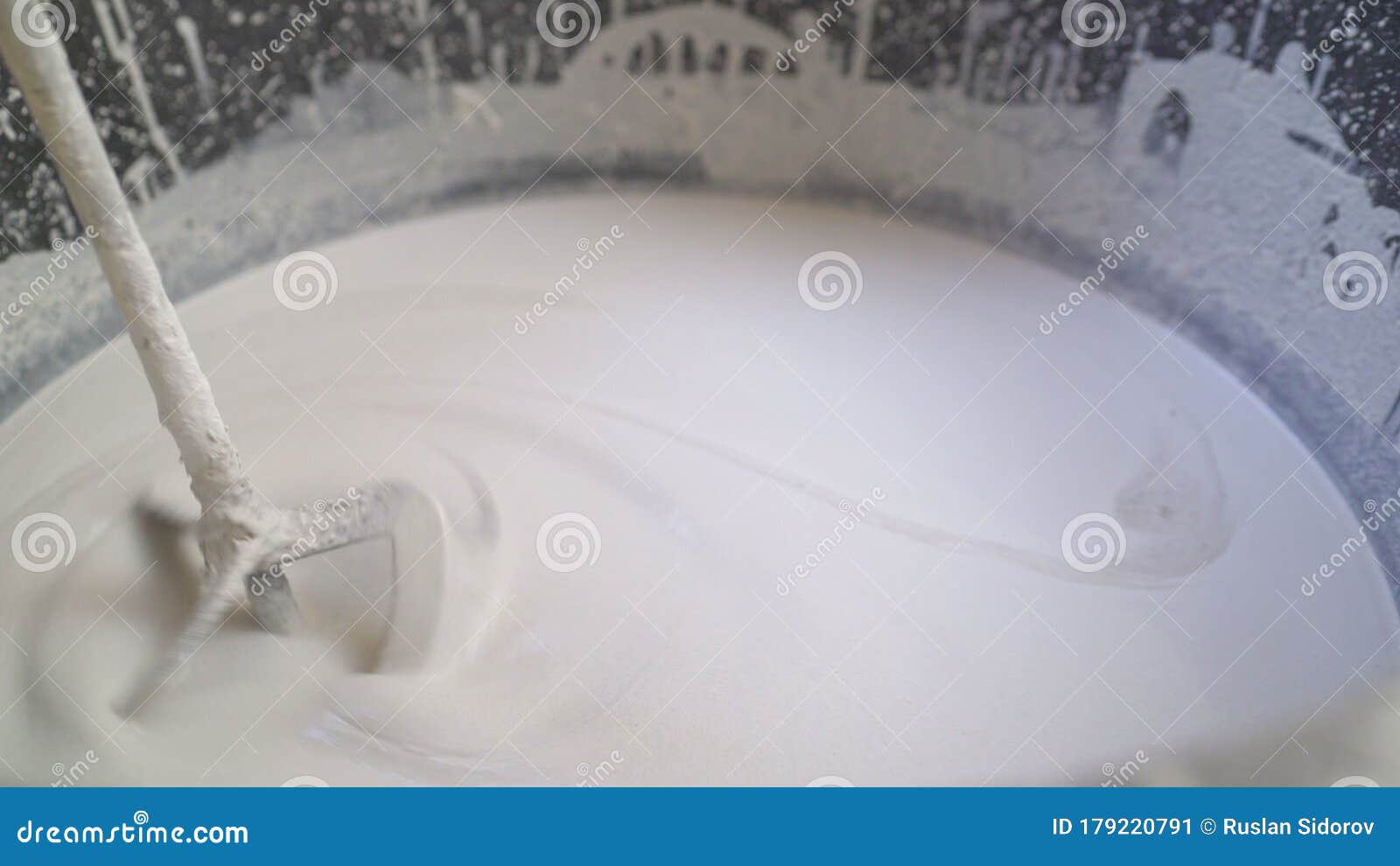 Bucket With A Solution. Knead The Solution With A Mixer In A Bucket Of ...