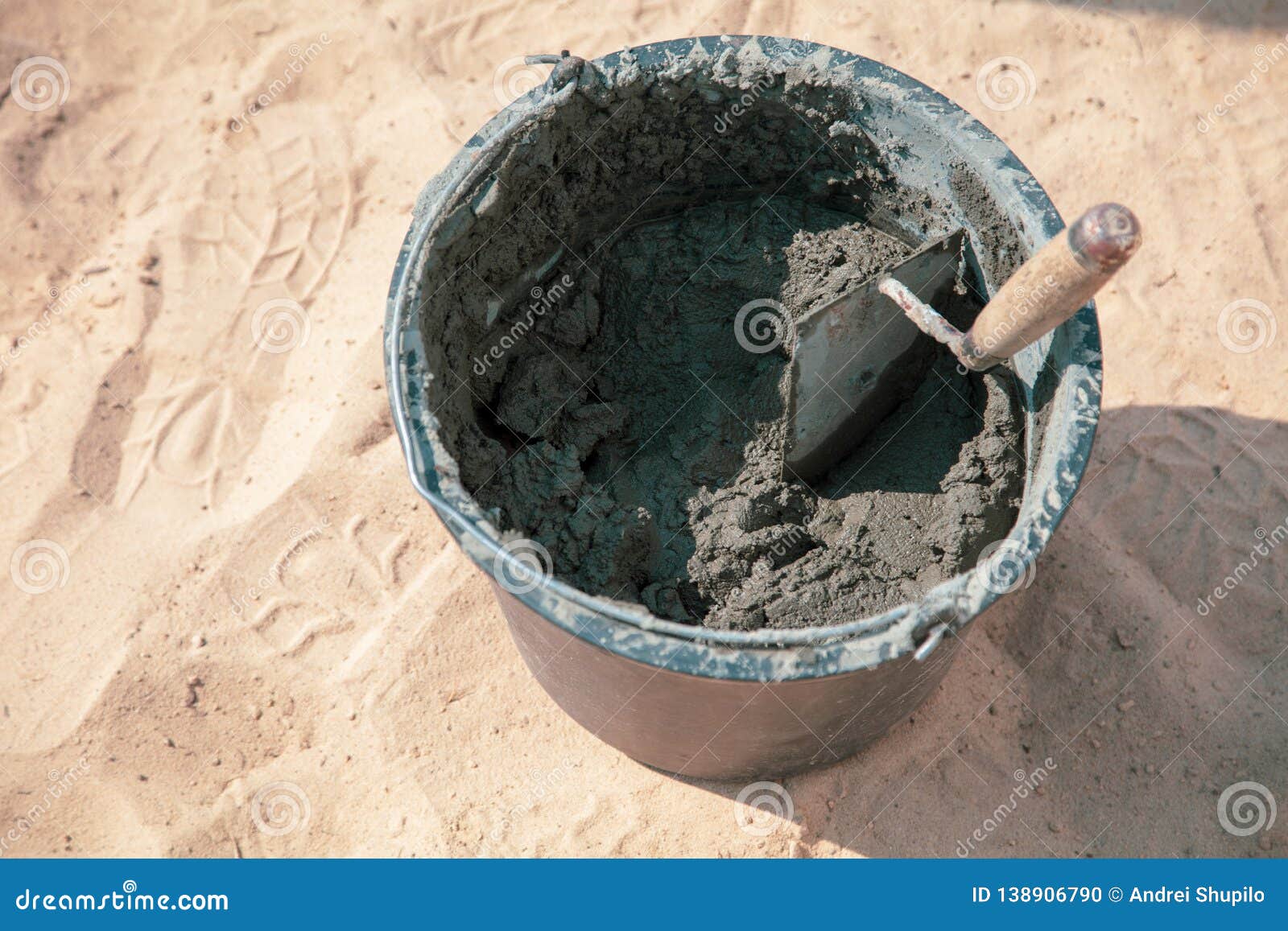 The Worker Mixes the Concrete Mixture at the Construction Site Stock ...