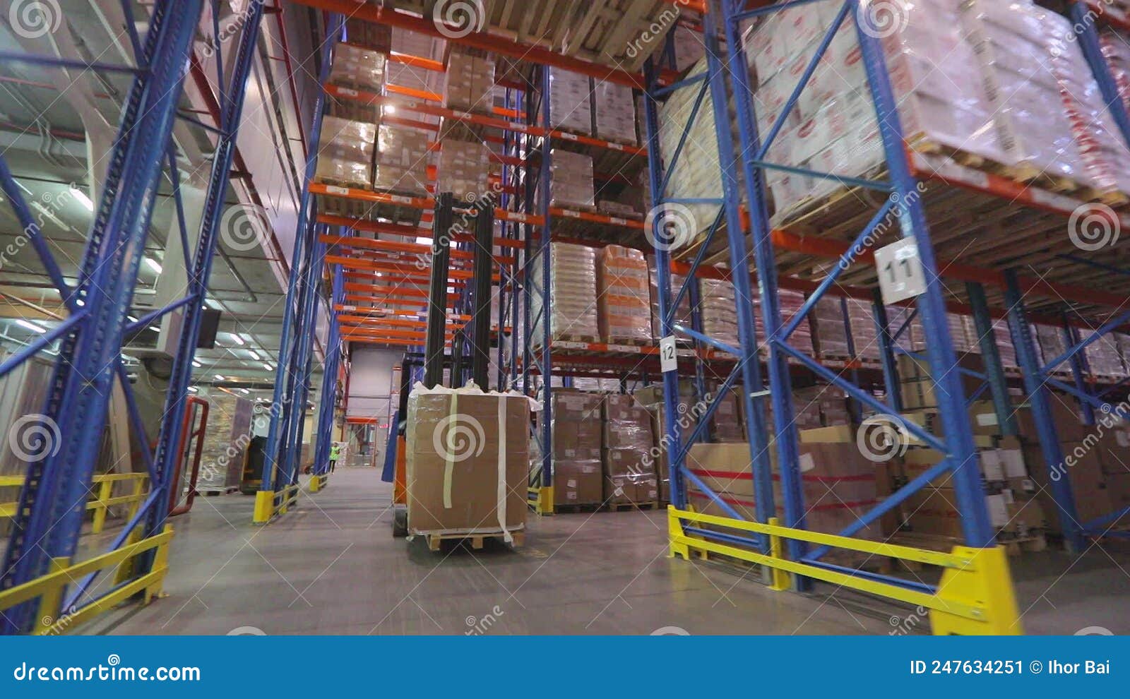 Forklift in a Modern Warehouse. Active Work in the Warehouse. Warehouse ...