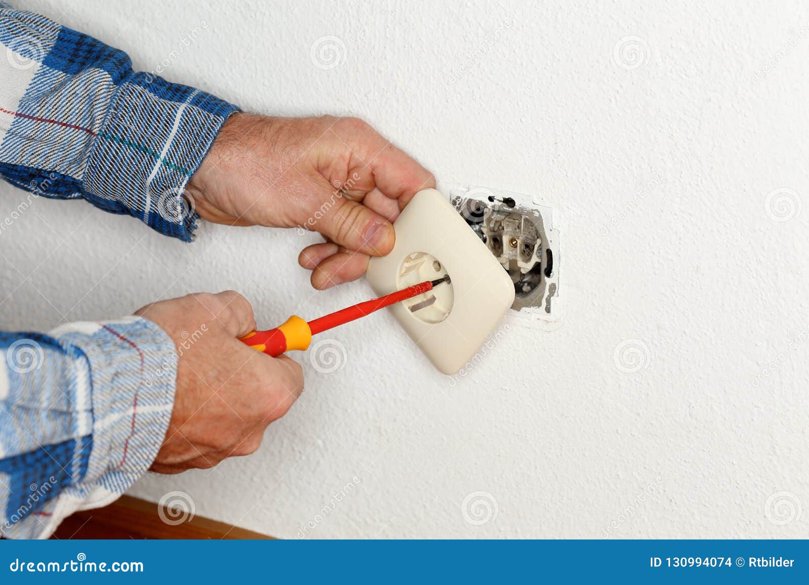 Worker is Mounting an Electrical Socket Stock Photo - Image of ...