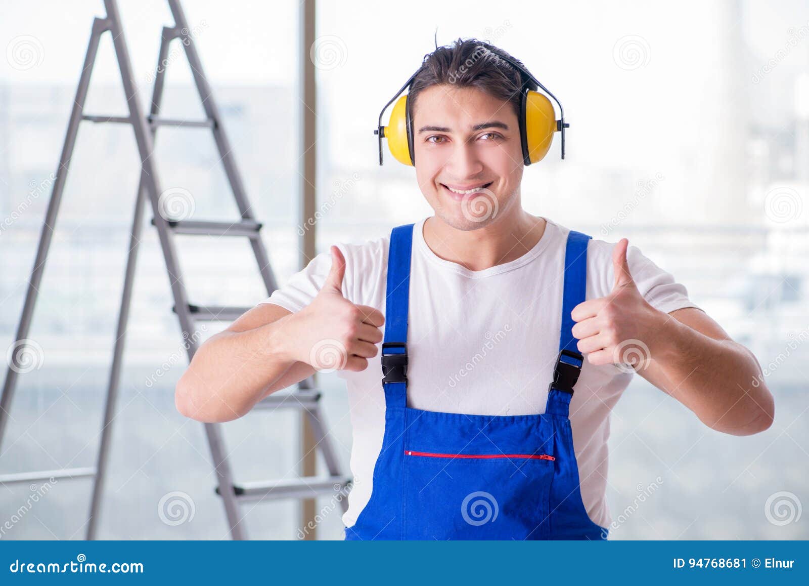 The Worker with Noise Cancelling Headphones Stock Image - Image of ...