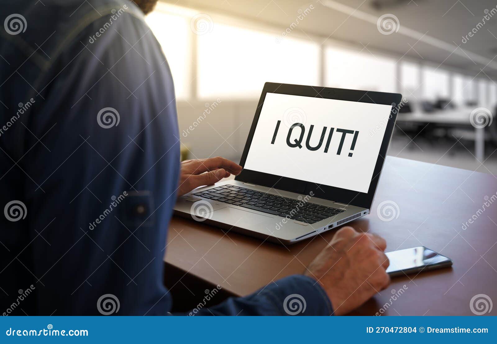 Worker in an Office with the Message I Quit on Screen Stock Photo ...