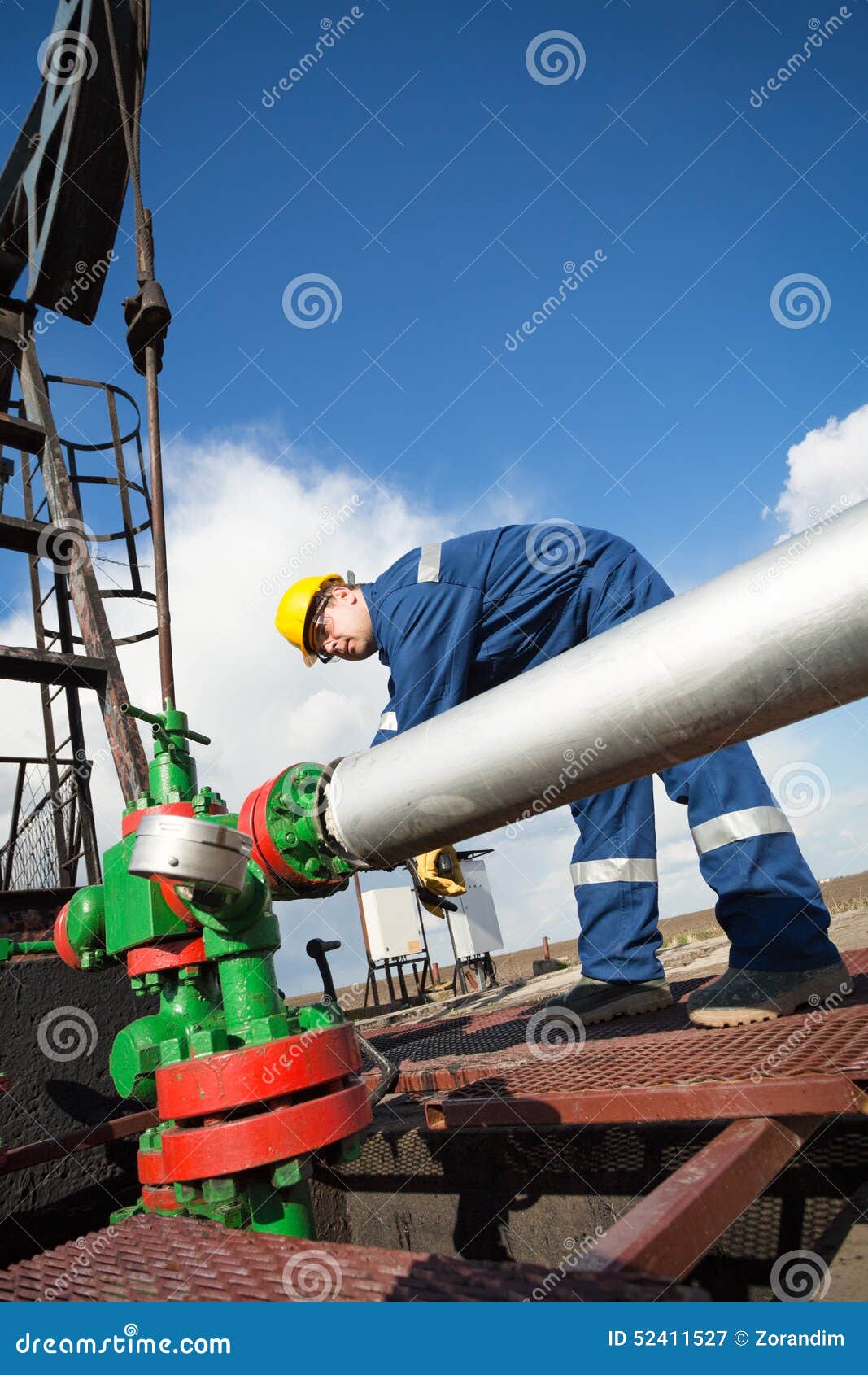 Worker on the oil field stock image. Image of person - 52411527