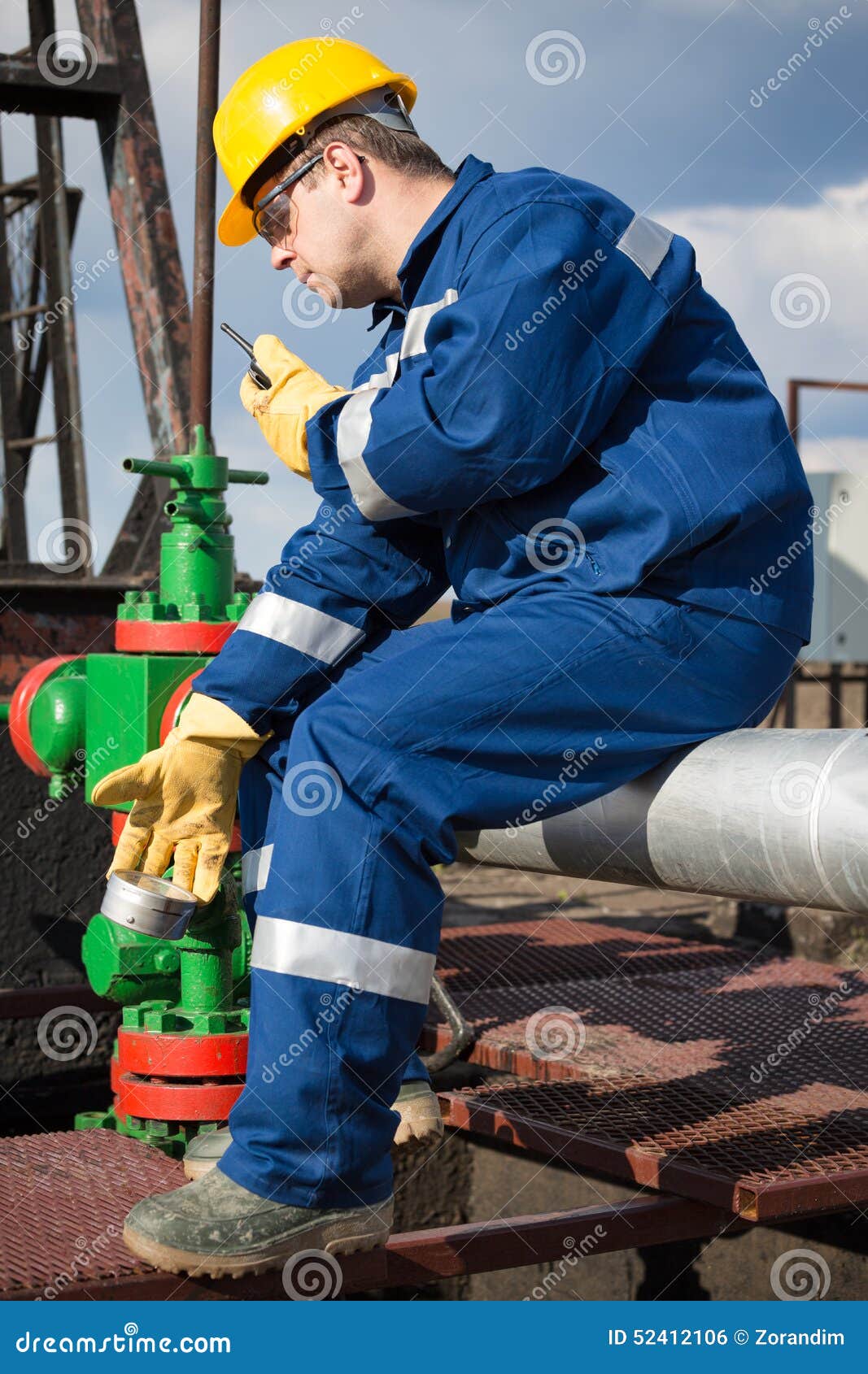 Worker on the oil field stock photo. Image of drilling - 52412106