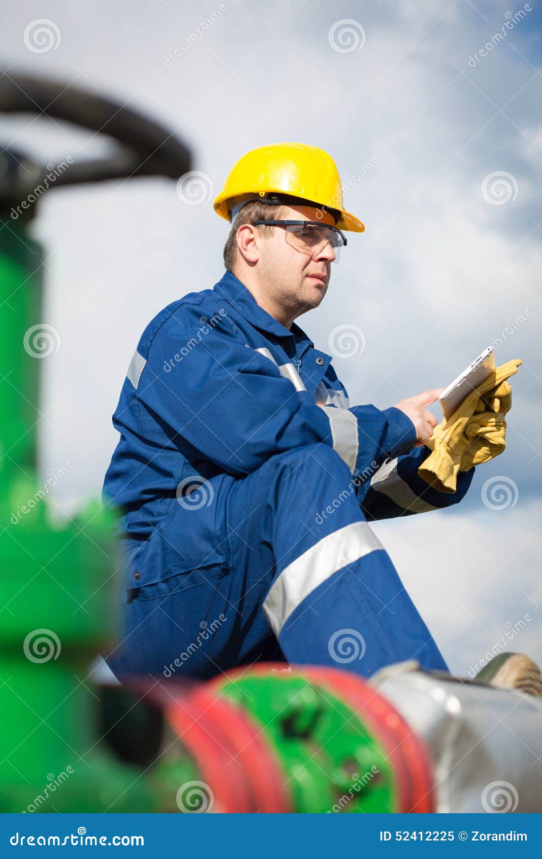 Worker on the oil field stock image. Image of industrial - 52412225