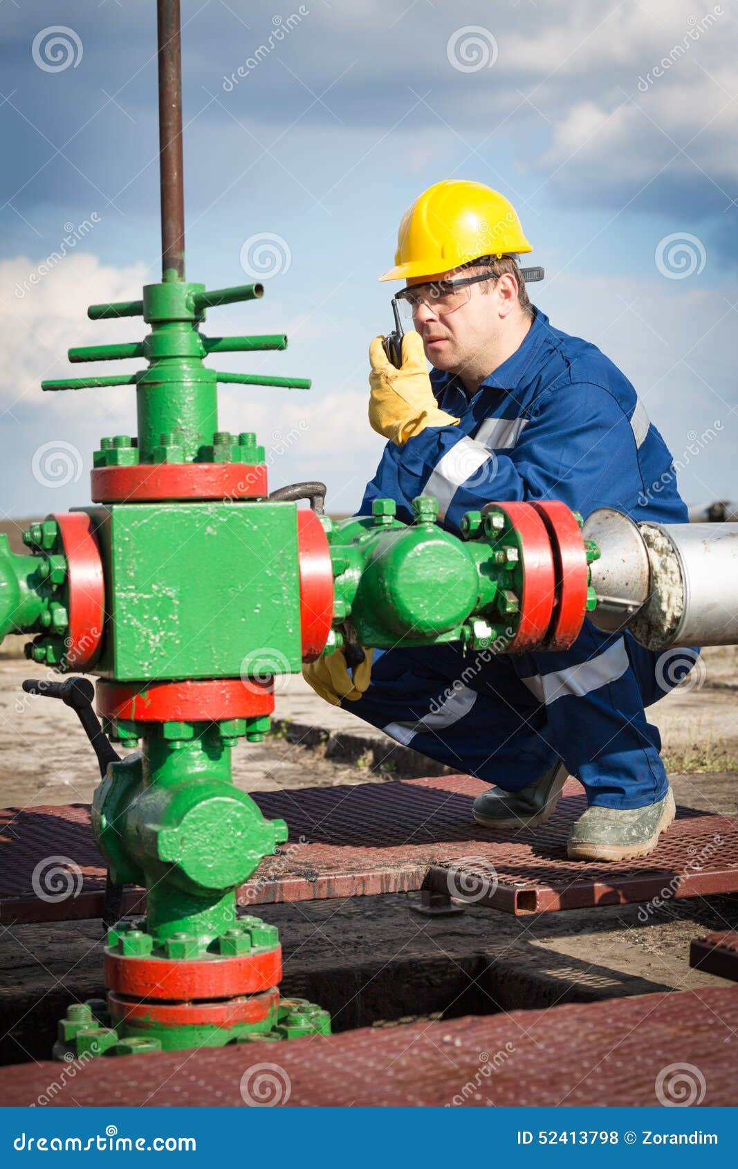Worker on the oil field stock photo. Image of construction - 52413798