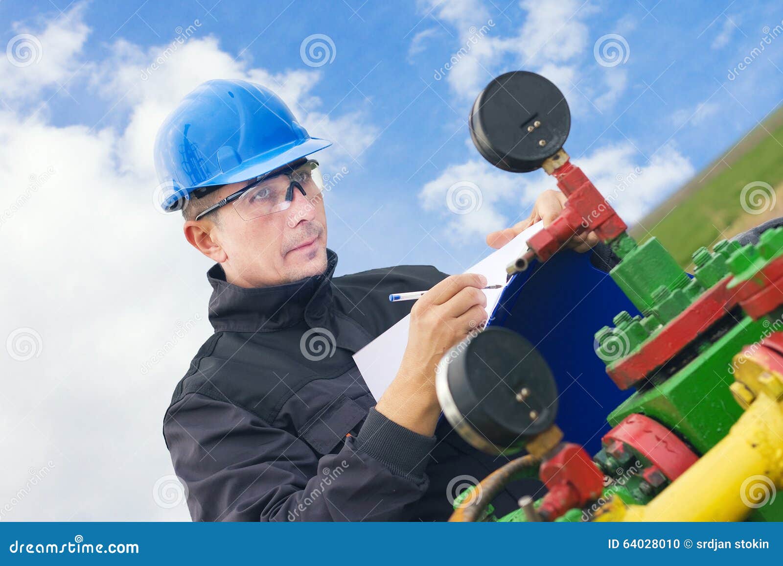 Worker on an oil pump stock photo. Image of crude, global - 64028010