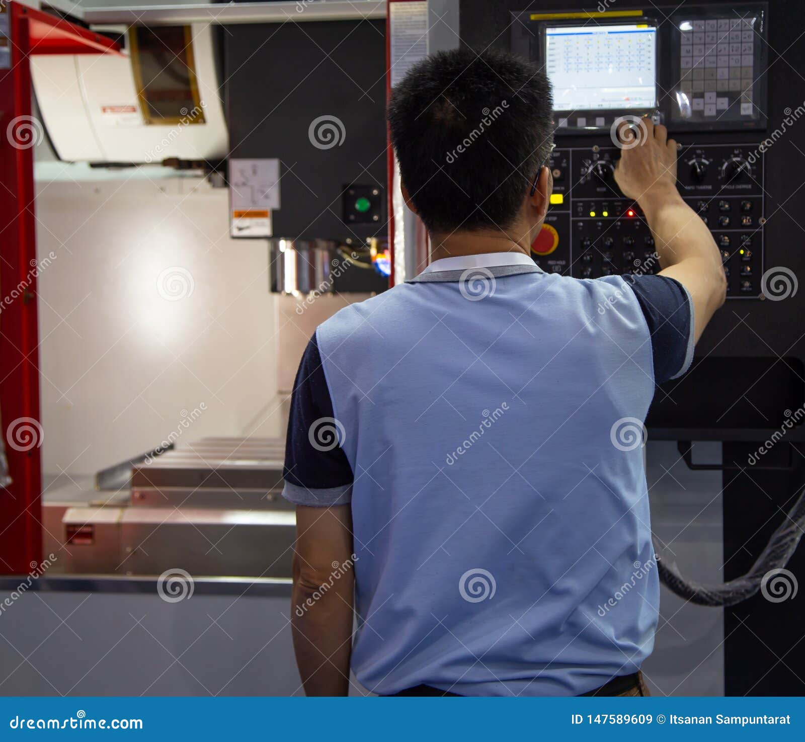 Worker operate CNC machine editorial stock image. Image of equipment ...