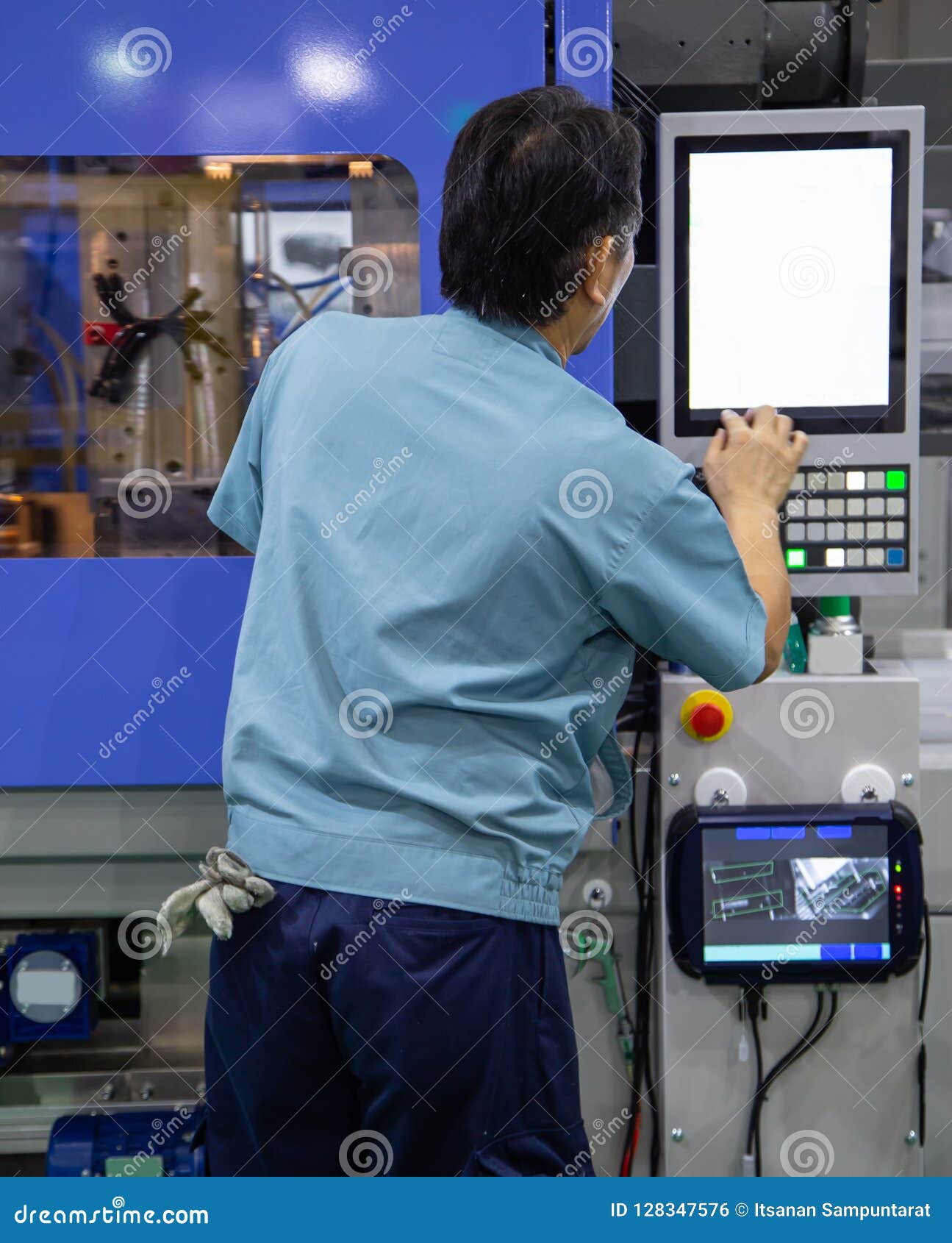 Plastic Injection Molding Machine In The Process Of Creating A Brick ...