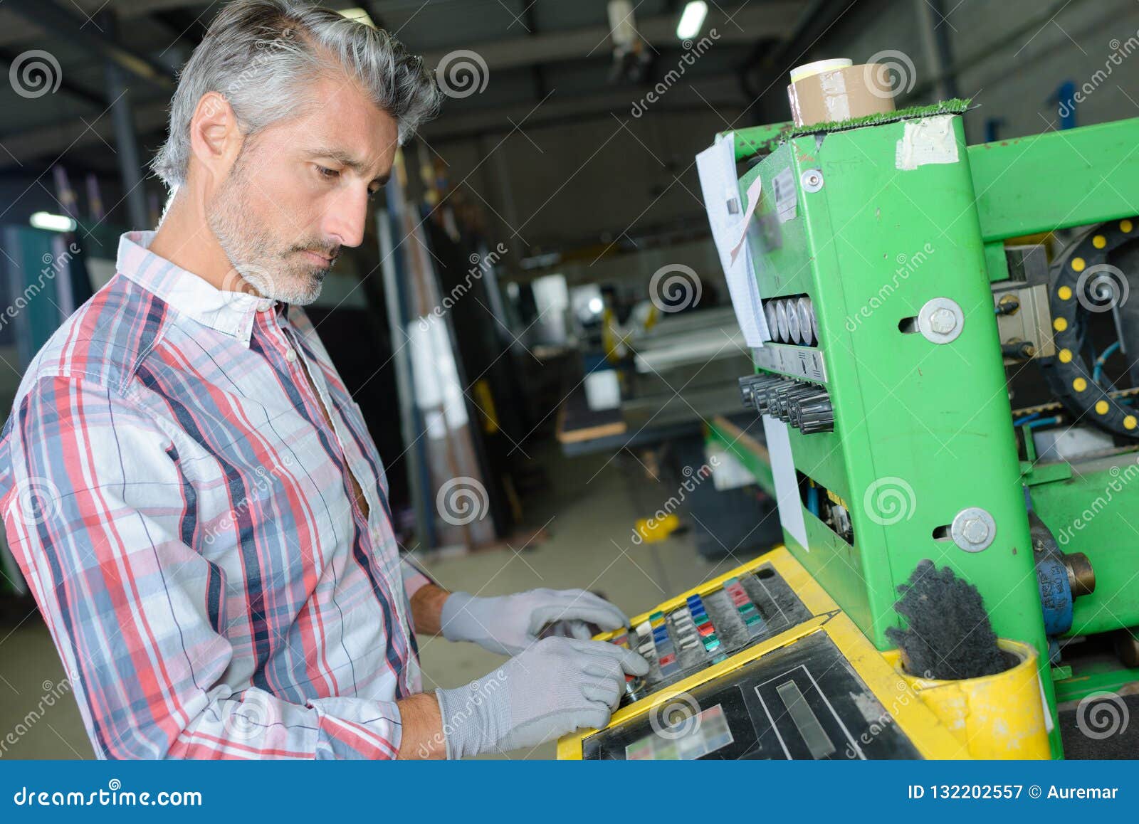 Worker Operating Machine in Factory Stock Image - Image of circular ...