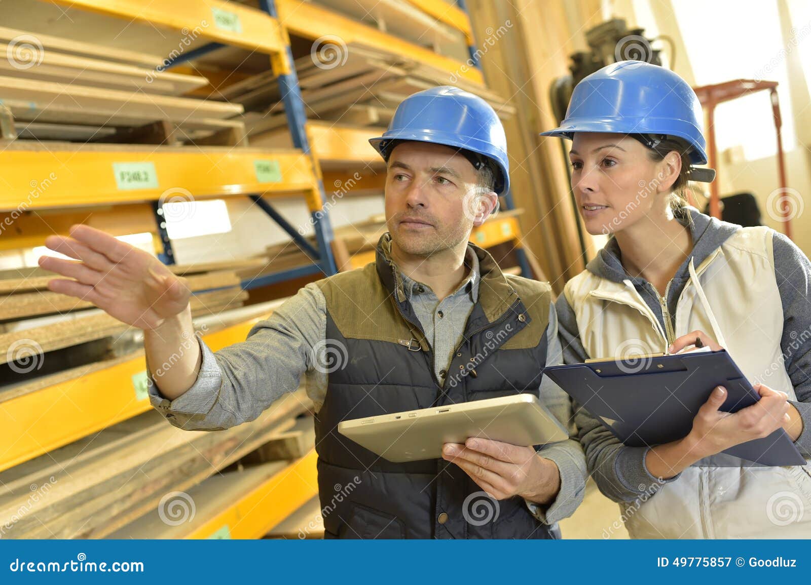 Worker with Overseer Controling Stock Stock Image - Image of ...