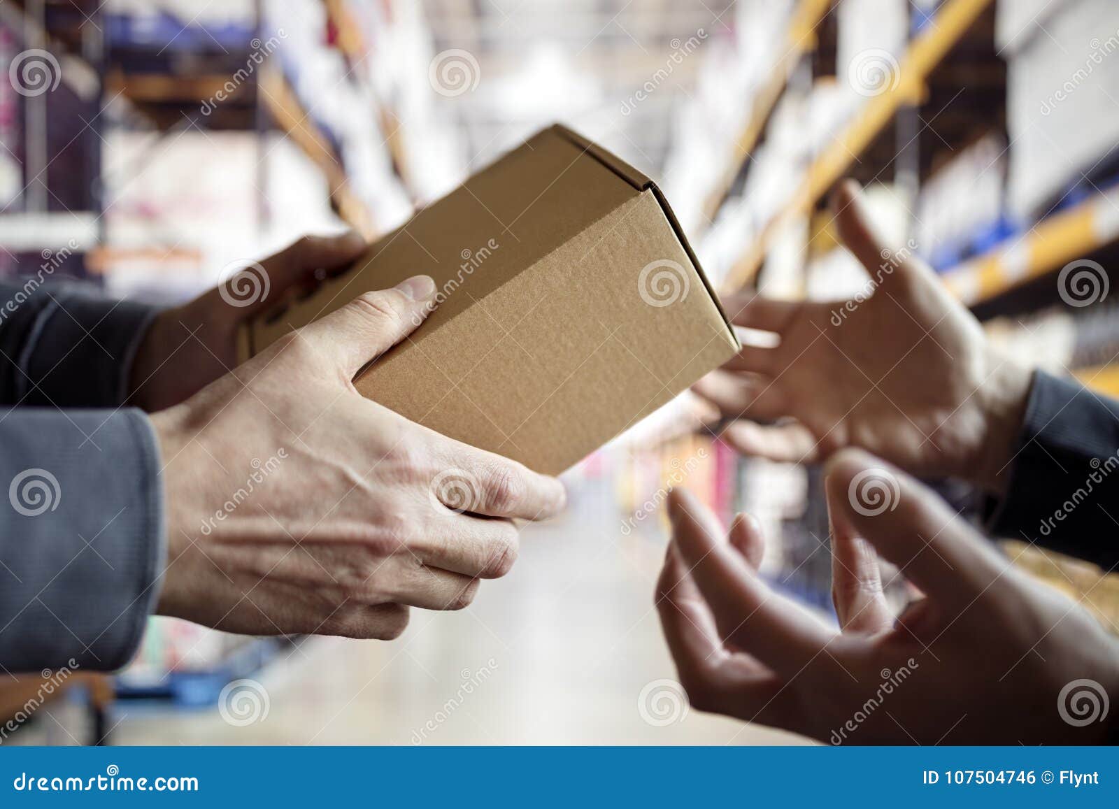 Worker with Package in a Distribution Warehouse Stock Photo - Image of ...