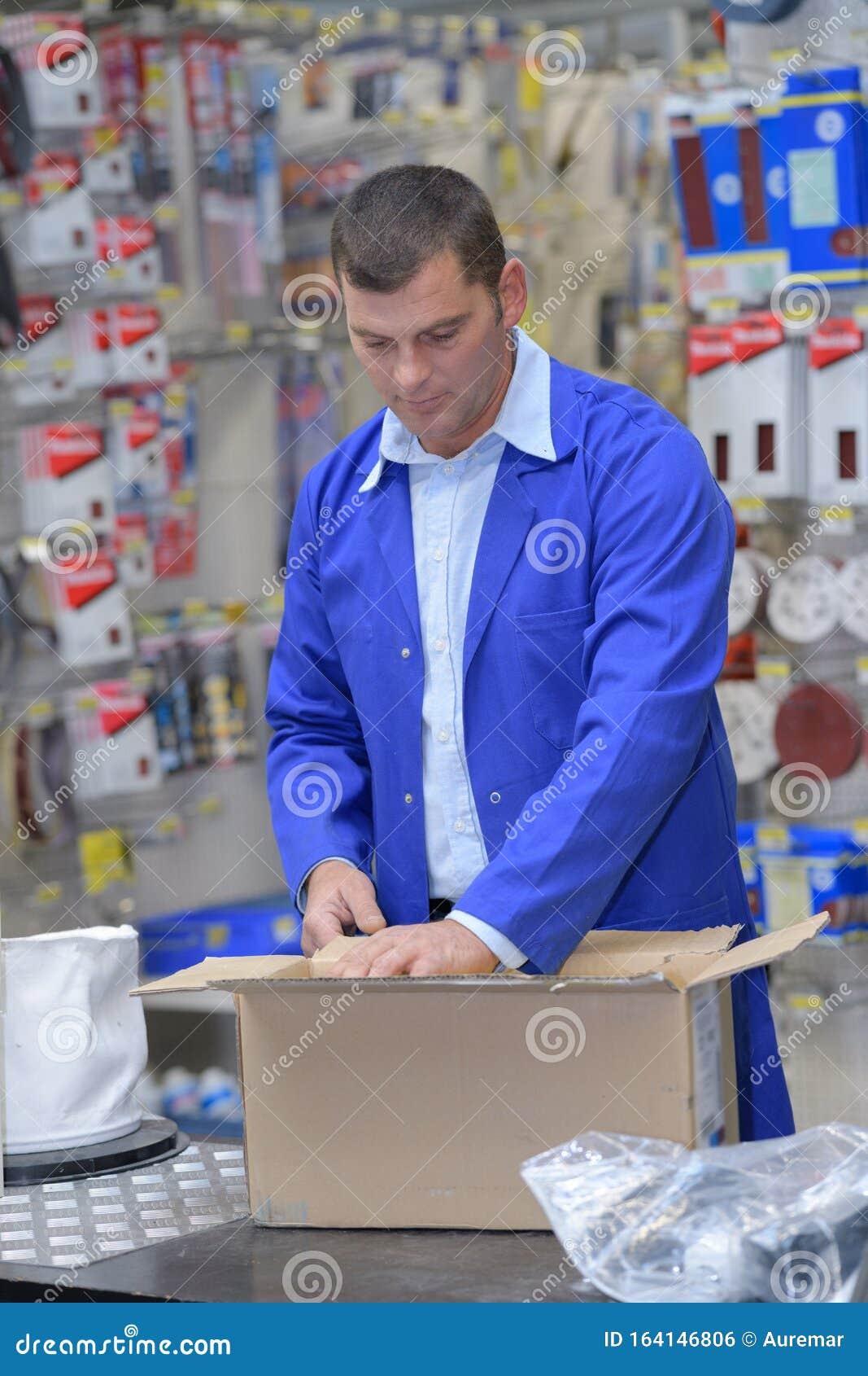 Worker Packing Order into Cardboard Box Stock Photo - Image of hold ...