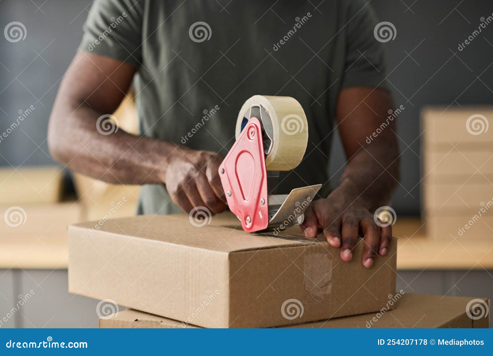 Worker Packing Parcel with Adhesive Tape Stock Photo - Image of worker ...