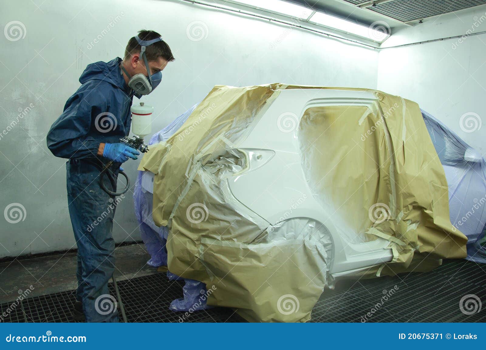 Worker painting a car. stock image. Image of fender, door - 20675371