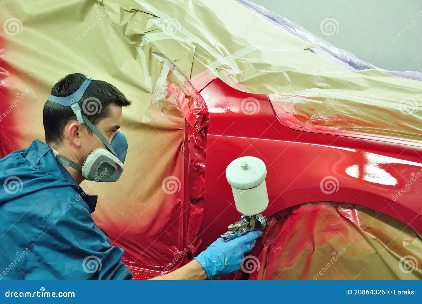 Worker painting a car. stock photo. Image of paintwork - 20864326