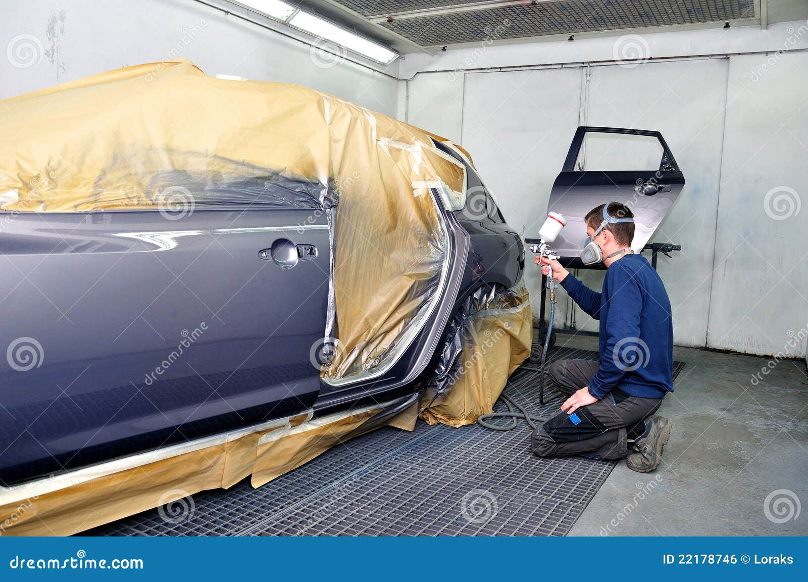 Worker painting a car. stock photo. Image of lacquer - 22178746