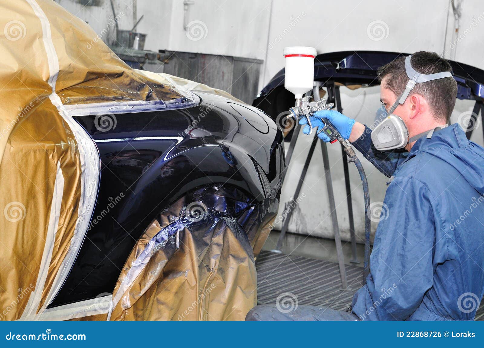 Worker painting a car. stock photo. Image of mechanic - 22868726