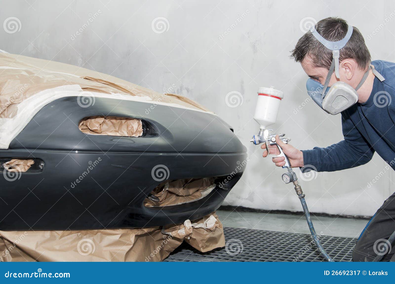 Worker painting a car. stock image. Image of garage, painter - 26692317