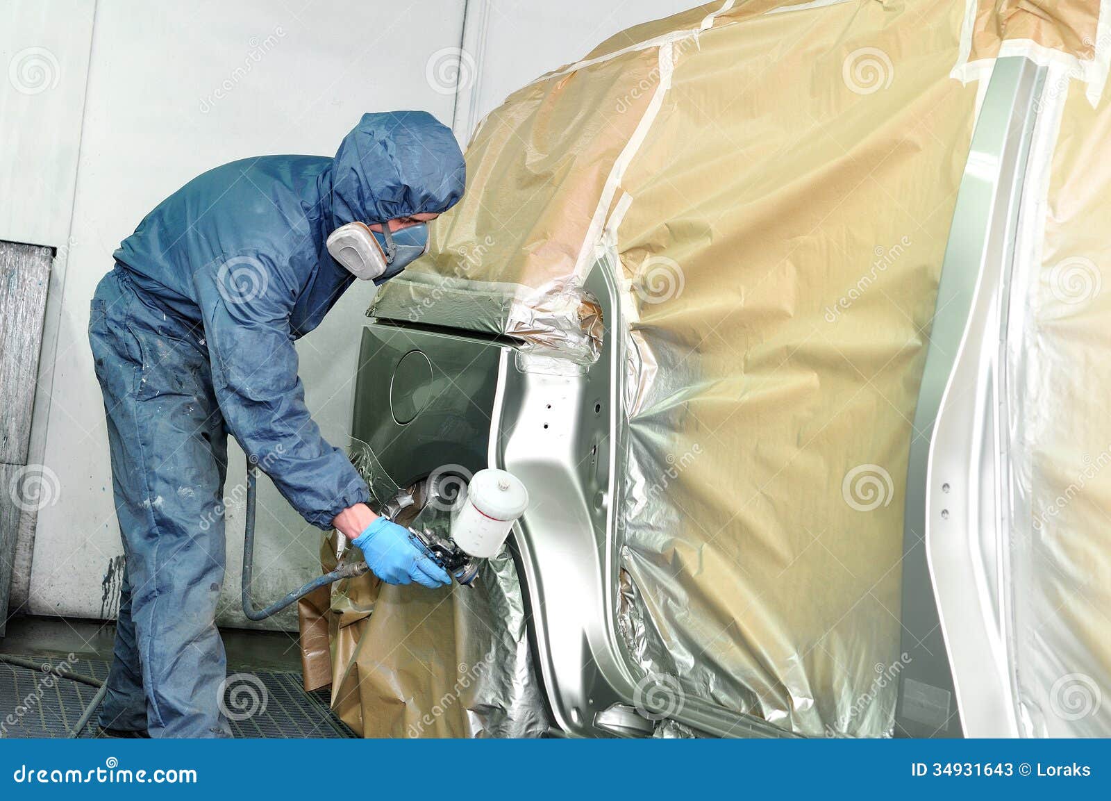 Worker painting a car. stock image. Image of lacquer - 34931643