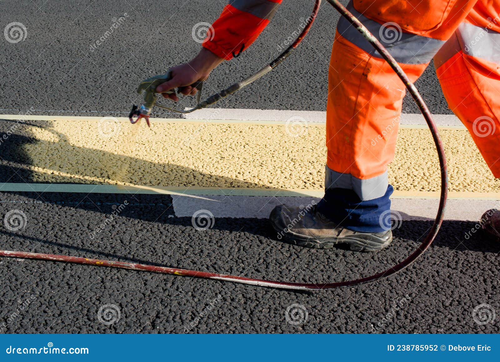 Worker Painting Road Strips and Signage Stock Photo - Image of signage ...