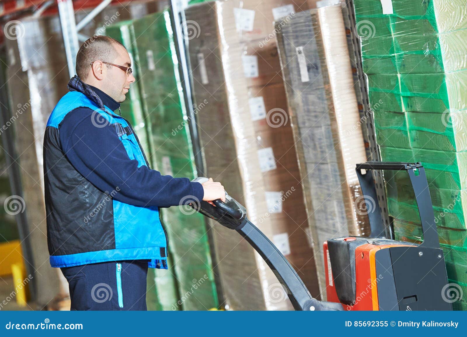 Worker with Pallet Truck Stacking Cardboxes Stock Image - Image of ...
